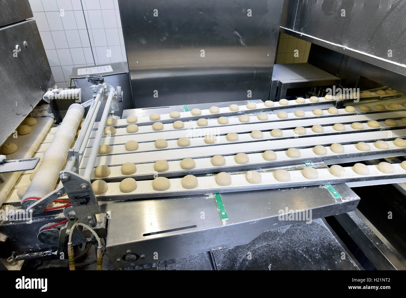 Production line in a baking factory with dough Stock Photo - Alamy