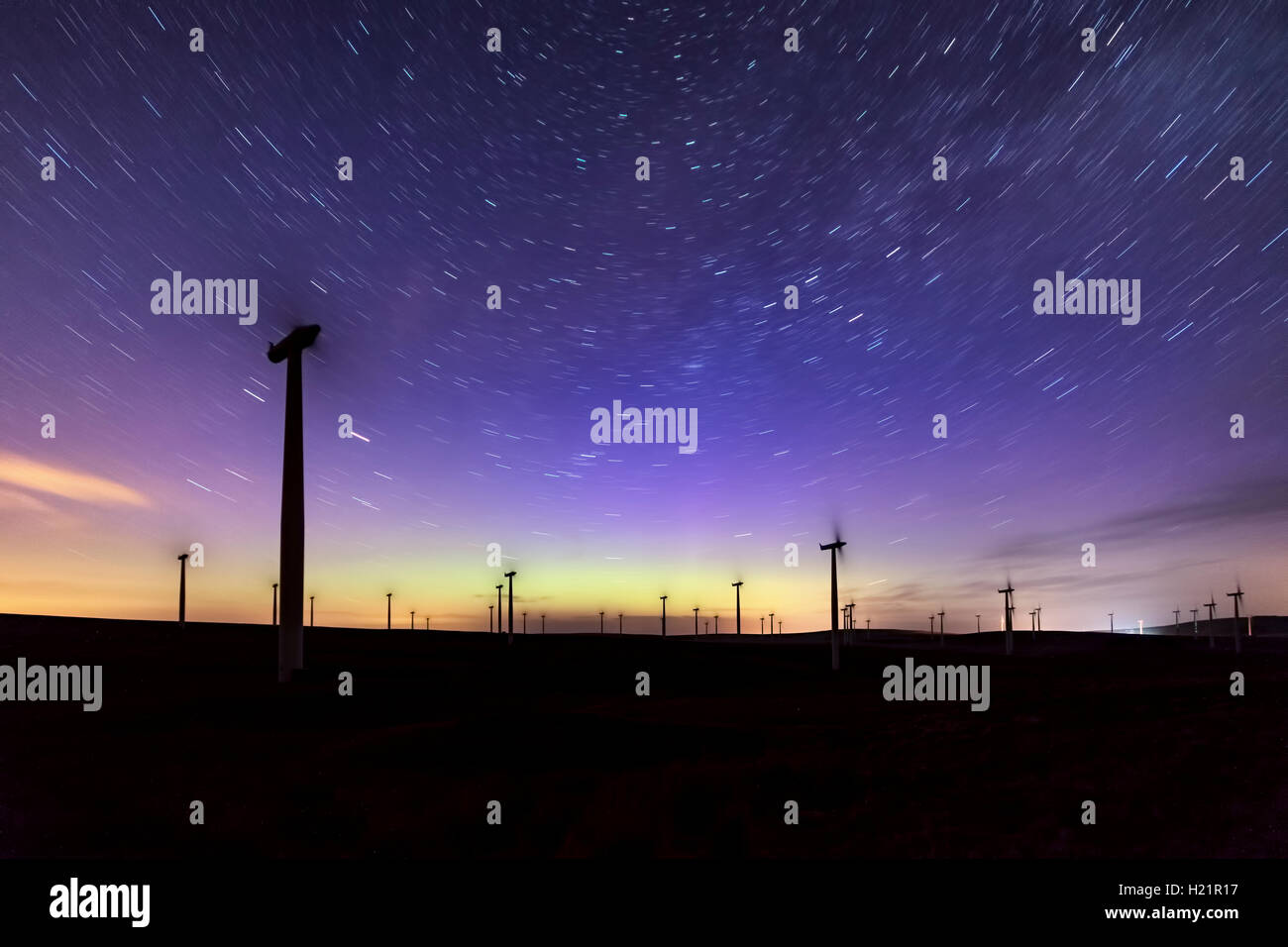 Scotland, Dunbar, wind park, aurora borealis and stars Stock Photo - Alamy