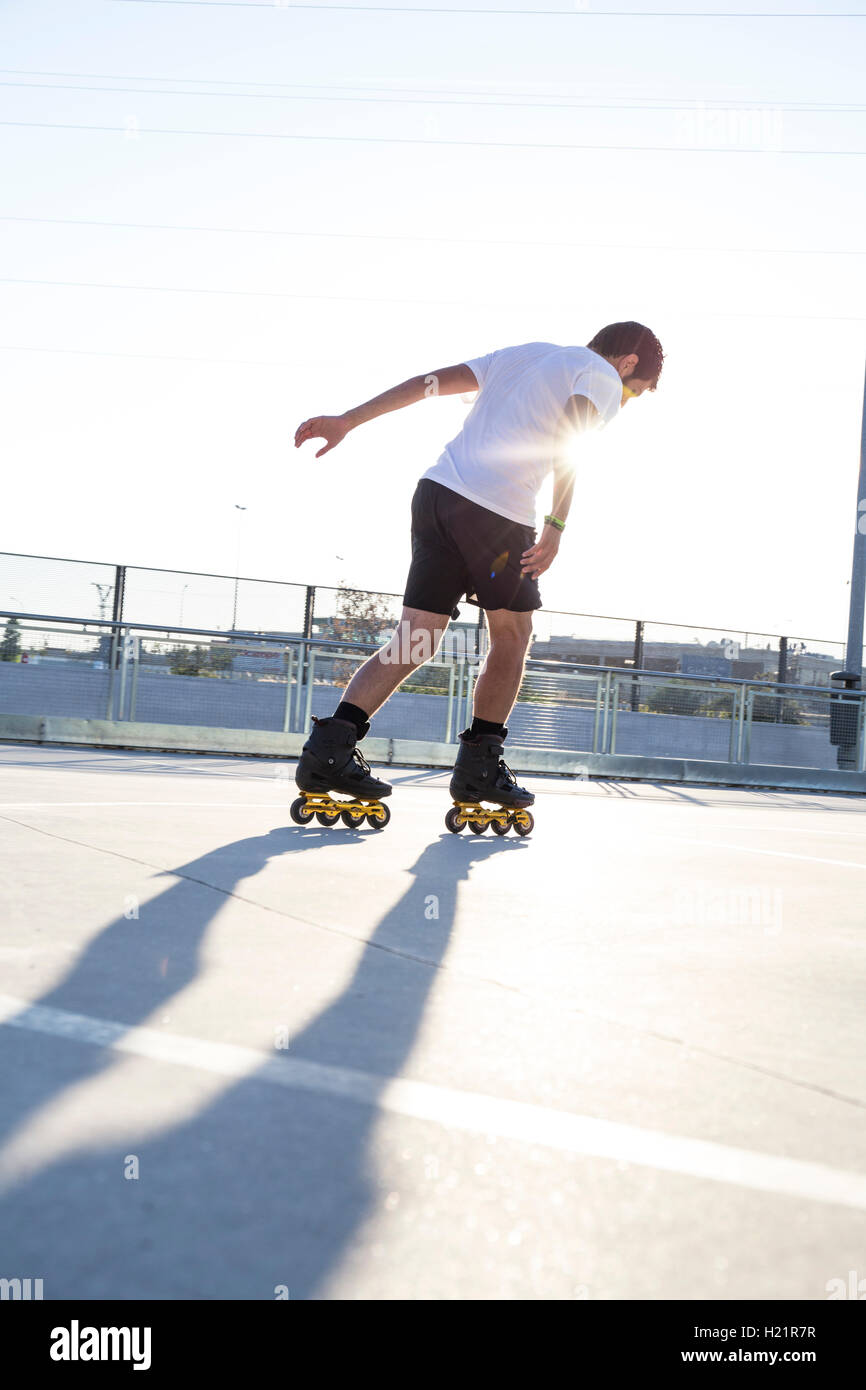 Man with rollerblades skating Stock Photo - Alamy