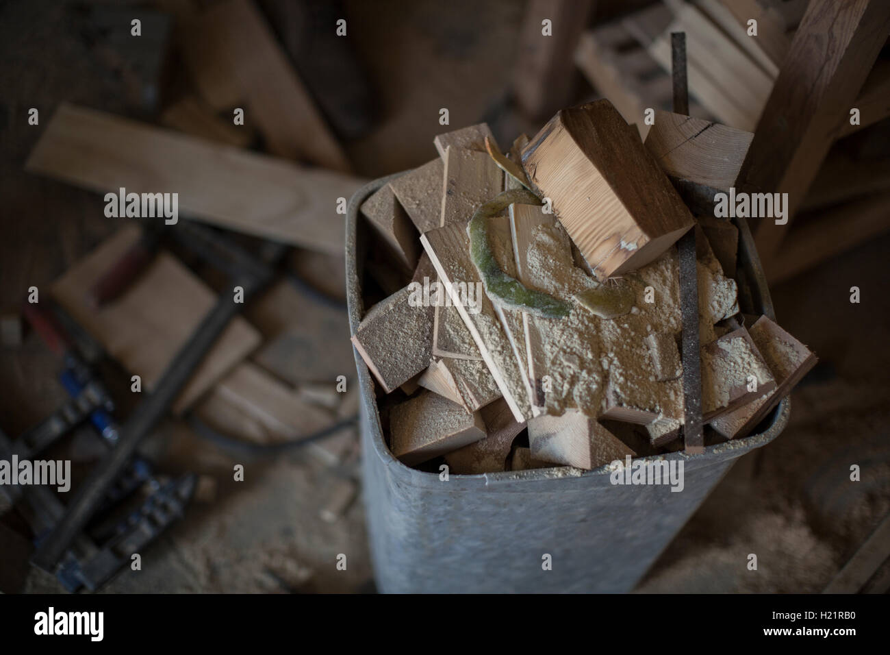 Bucket full of scrap wood pieces Stock Photo - Alamy