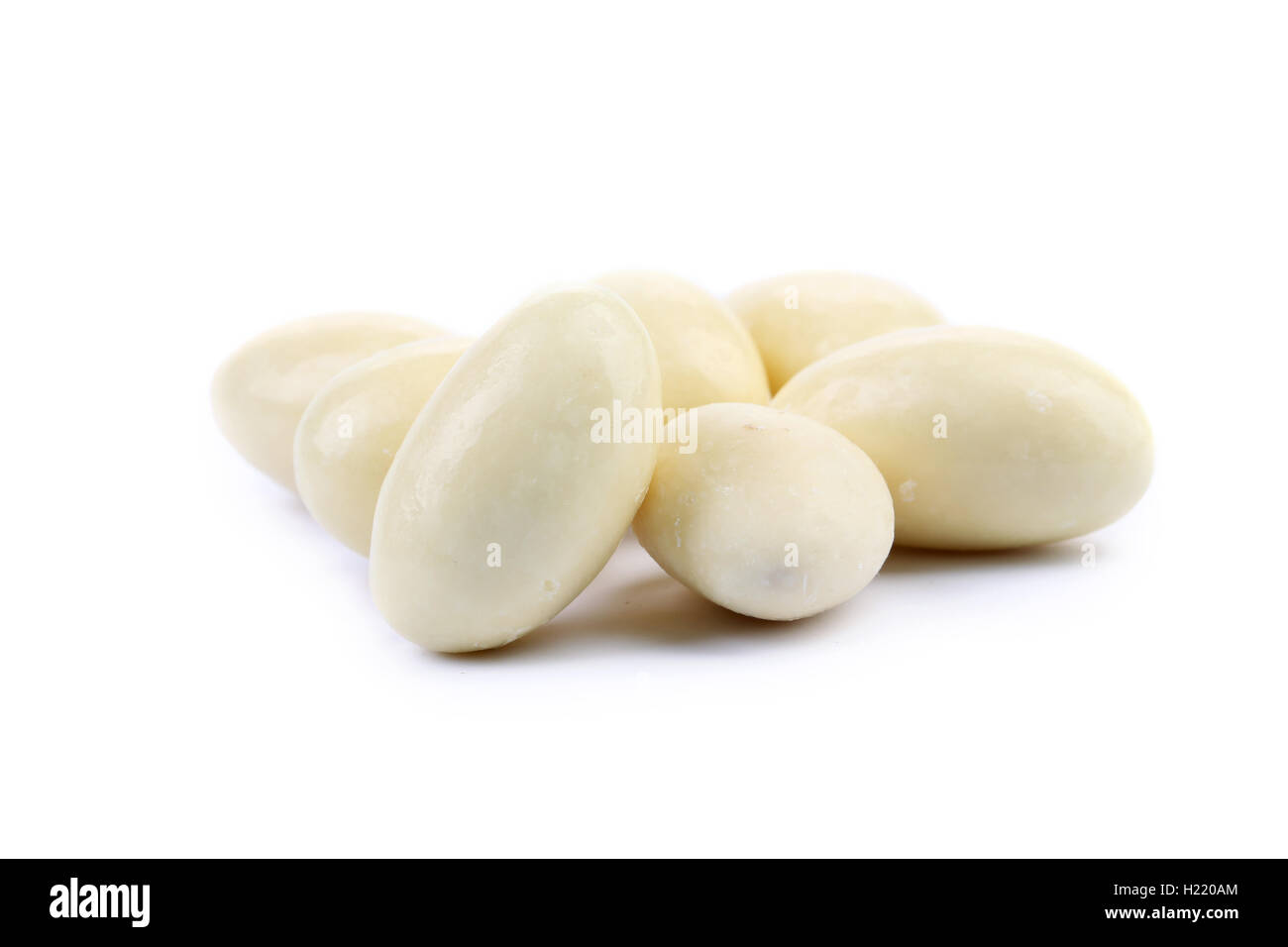 Candy in white chocolate Stock Photo - Alamy