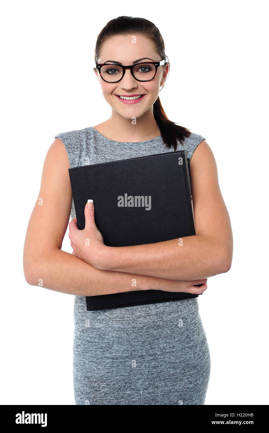 Female assistant holding office file Stock Photo - Alamy