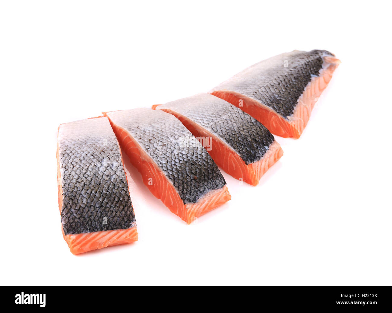 Salmon fillet cut in pieces close up Stock Photo - Alamy
