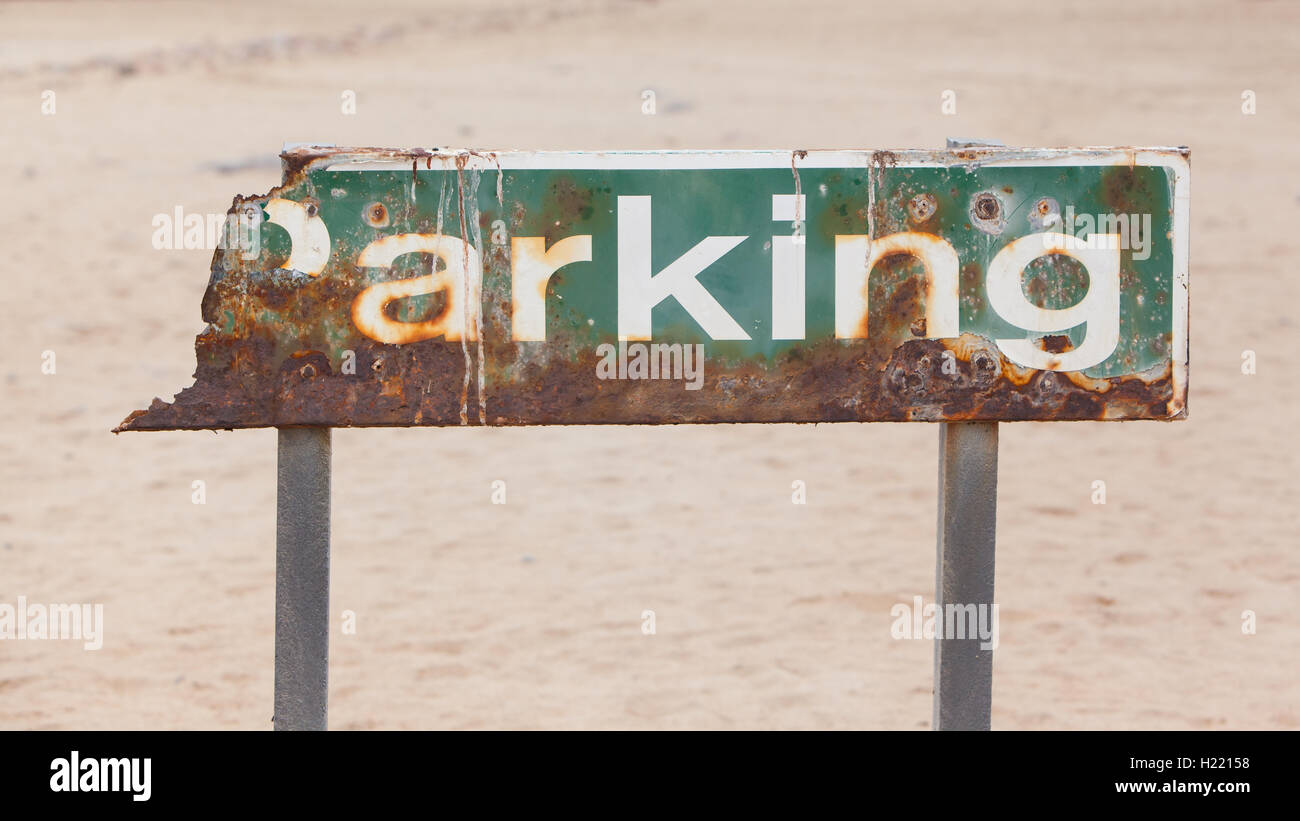 Old rusty parking sign Stock Photo - Alamy