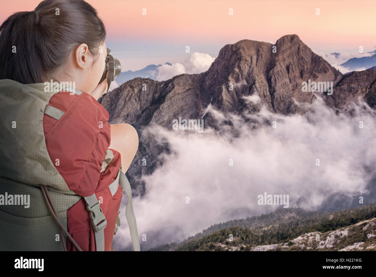 Young backpacker travel and take picture Stock Photo - Alamy