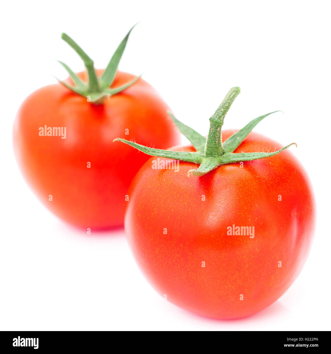 red ripe tomato isolated on white Stock Photo - Alamy