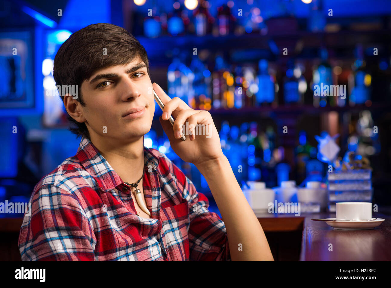 young man at the bar Stock Photo - Alamy