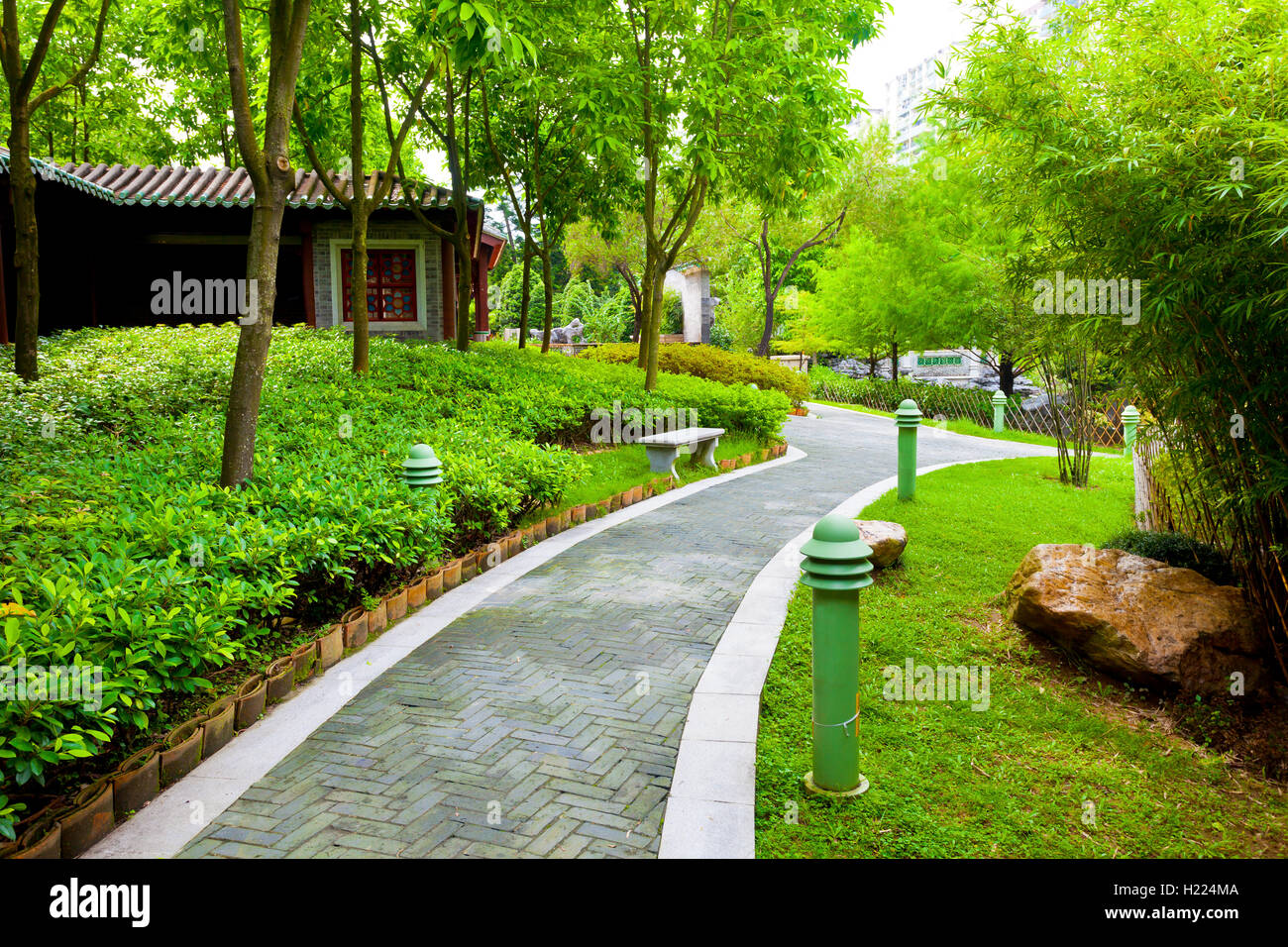 Chinese garden with walking path Stock Photo - Alamy