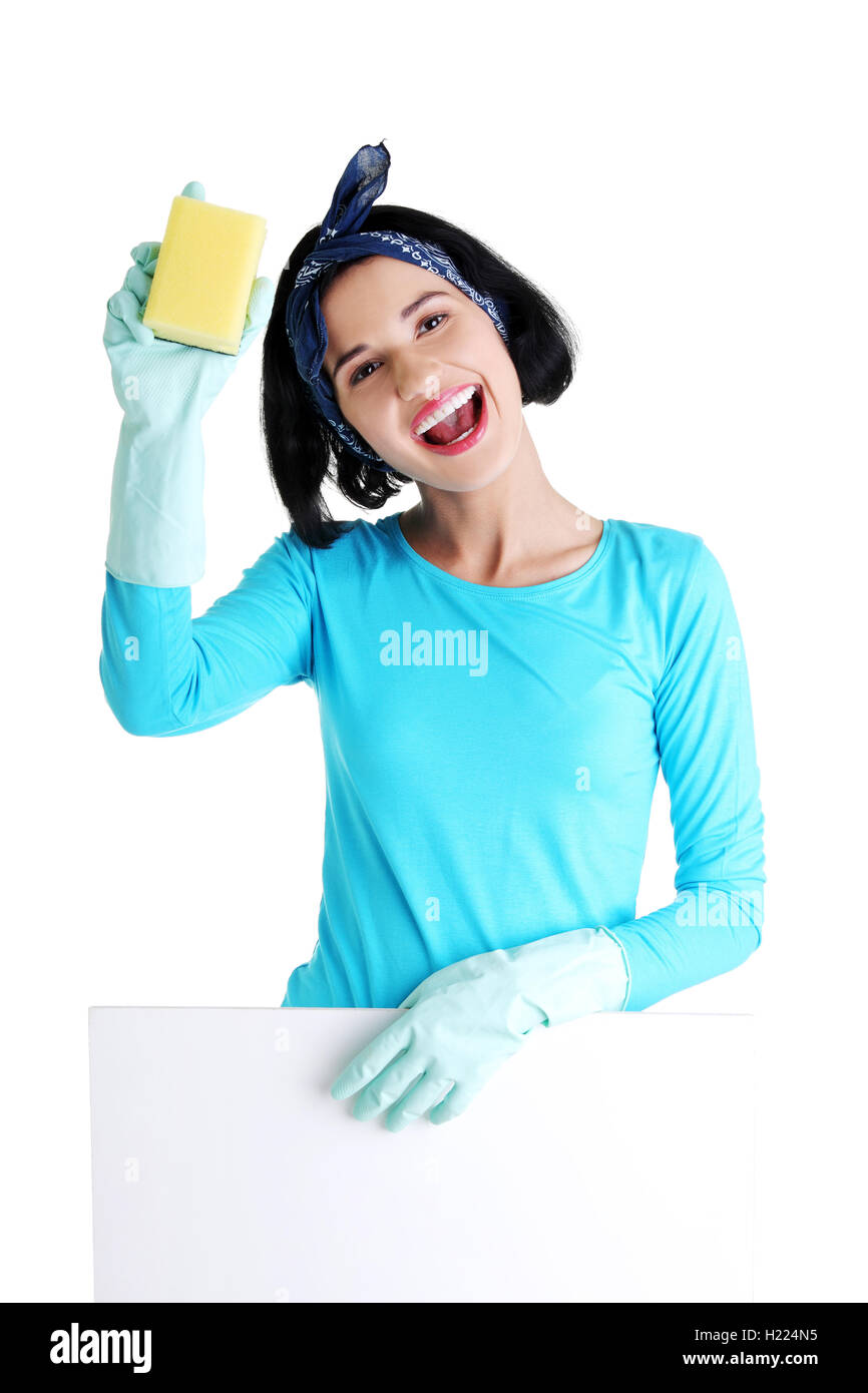 Cleaning woman showing blank sign board Stock Photo - Alamy