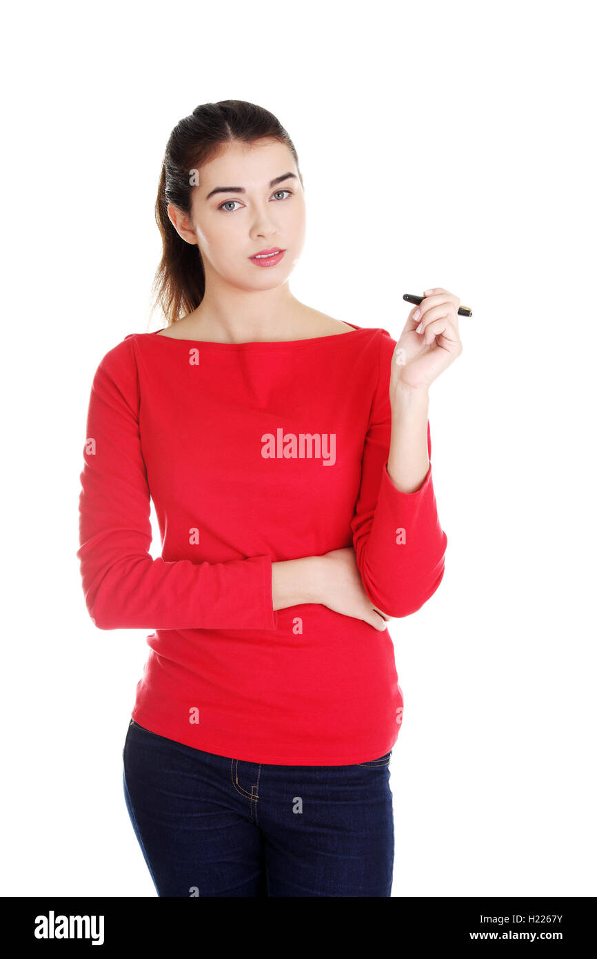 Happy smiling student girl with pen Stock Photo - Alamy