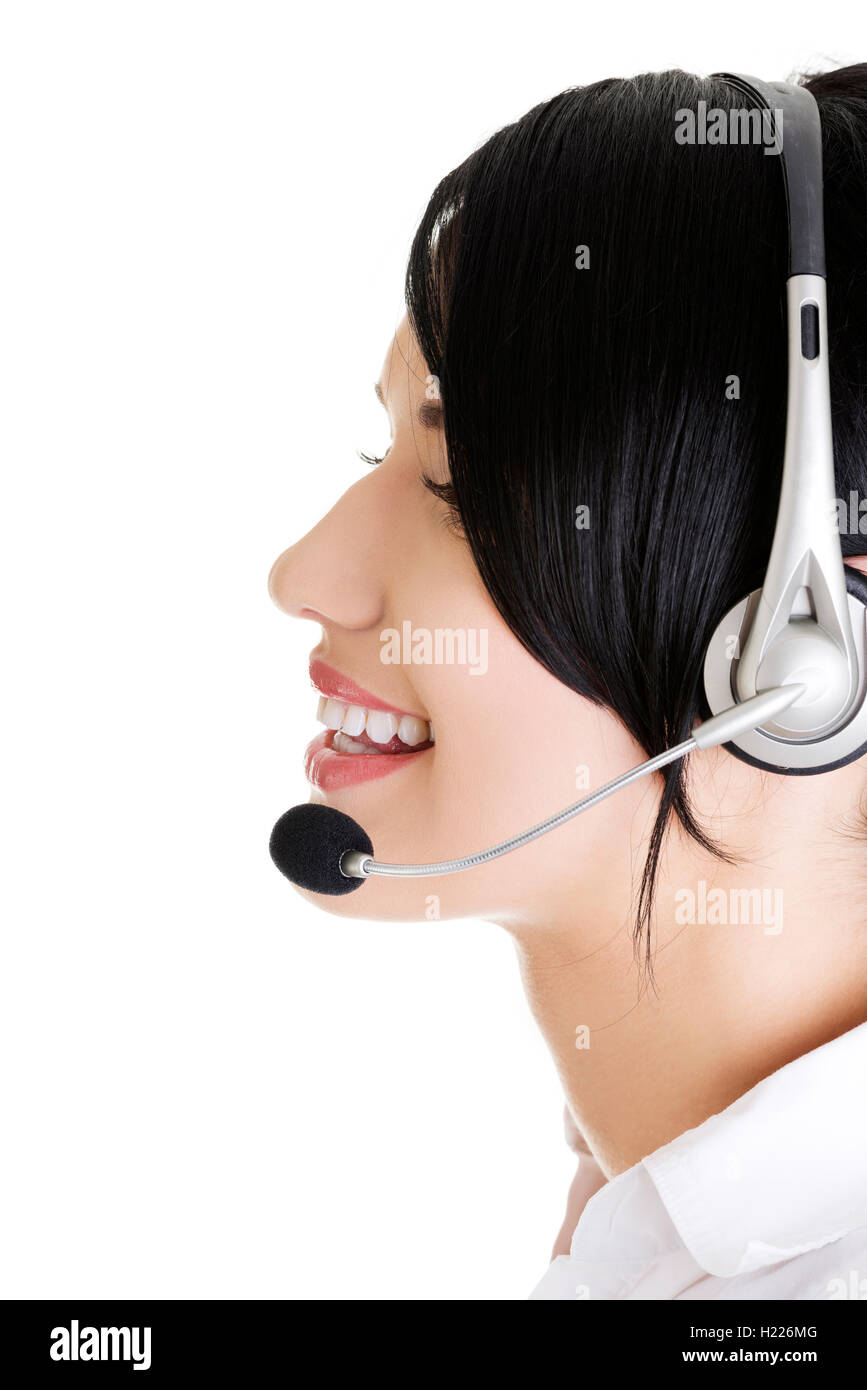 Beautiful young call-center assistant smiling Stock Photo - Alamy