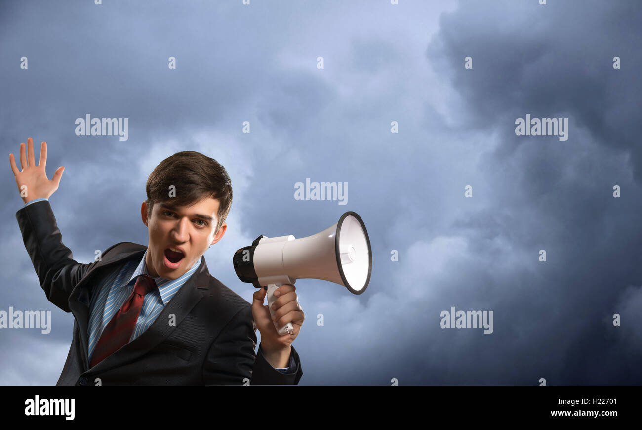 businessman shouting into a megaphone Stock Photo - Alamy