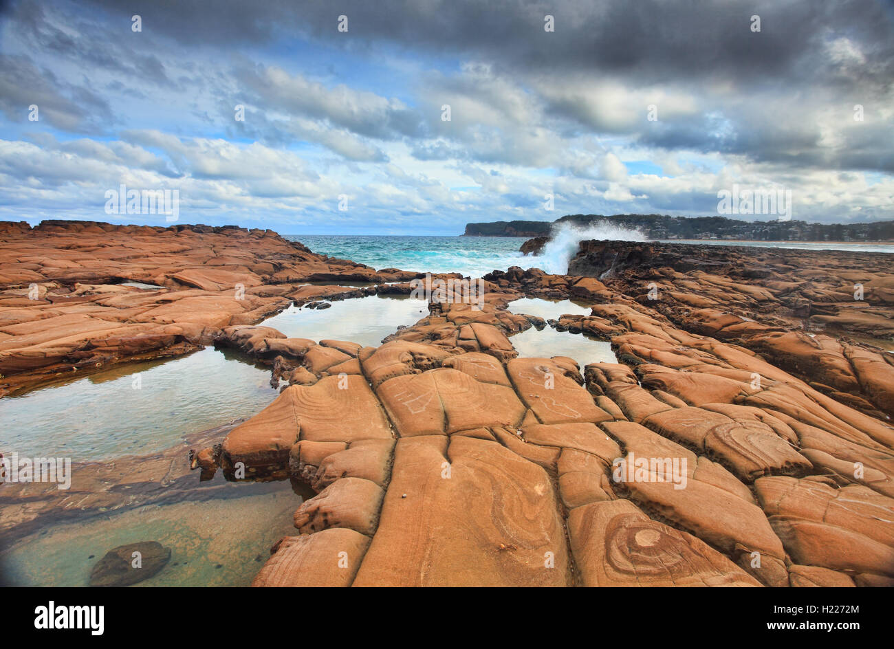 Waves splash on magnificent rock formations Stock Photo - Alamy