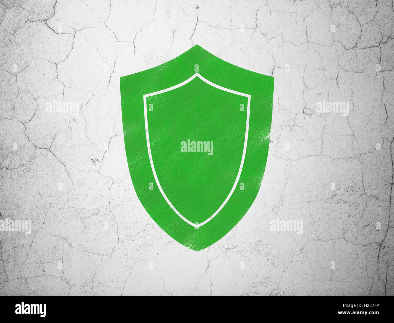Protection concept: Shield on wall background Stock Photo - Alamy