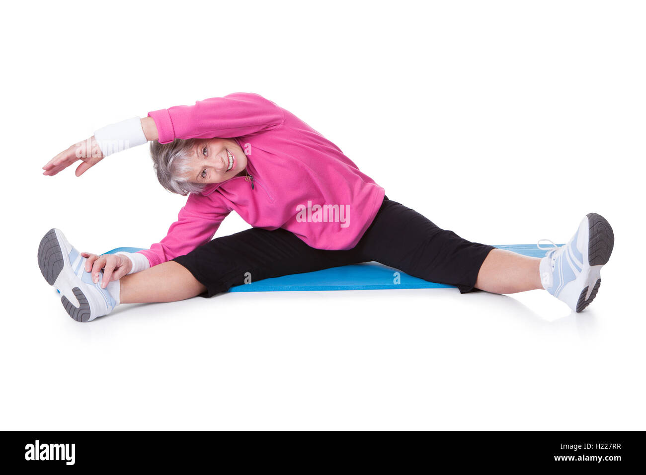 Cheerful senior woman exercise Cut Out Stock Images & Pictures - Alamy