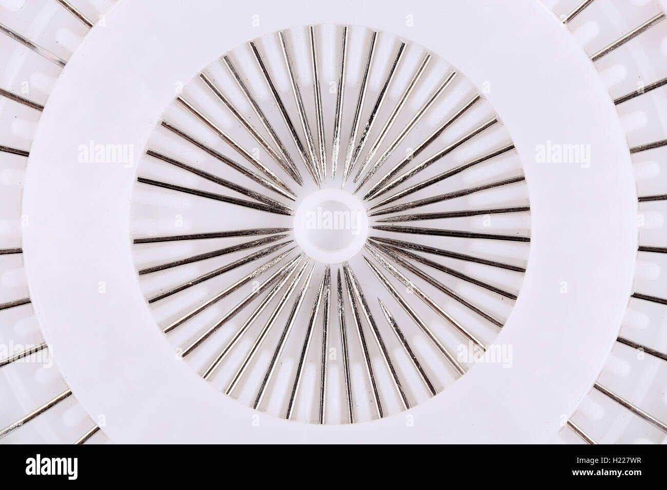 Lot of metal pins in circle Stock Photo - Alamy