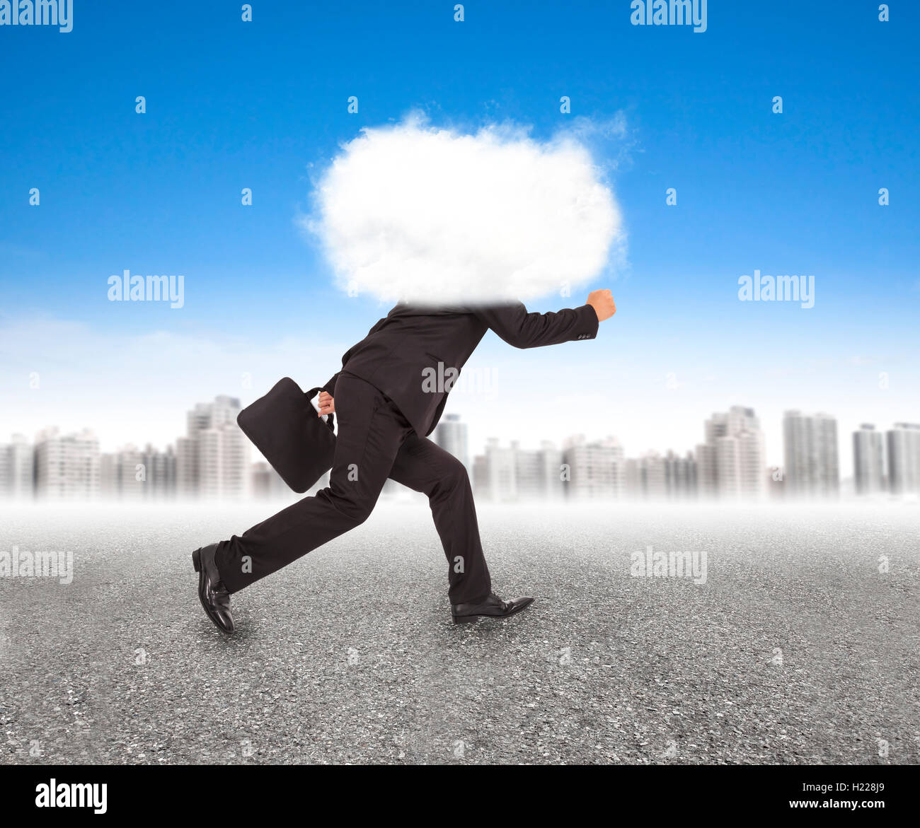 Business man running clouds hi-res stock photography and images - Alamy