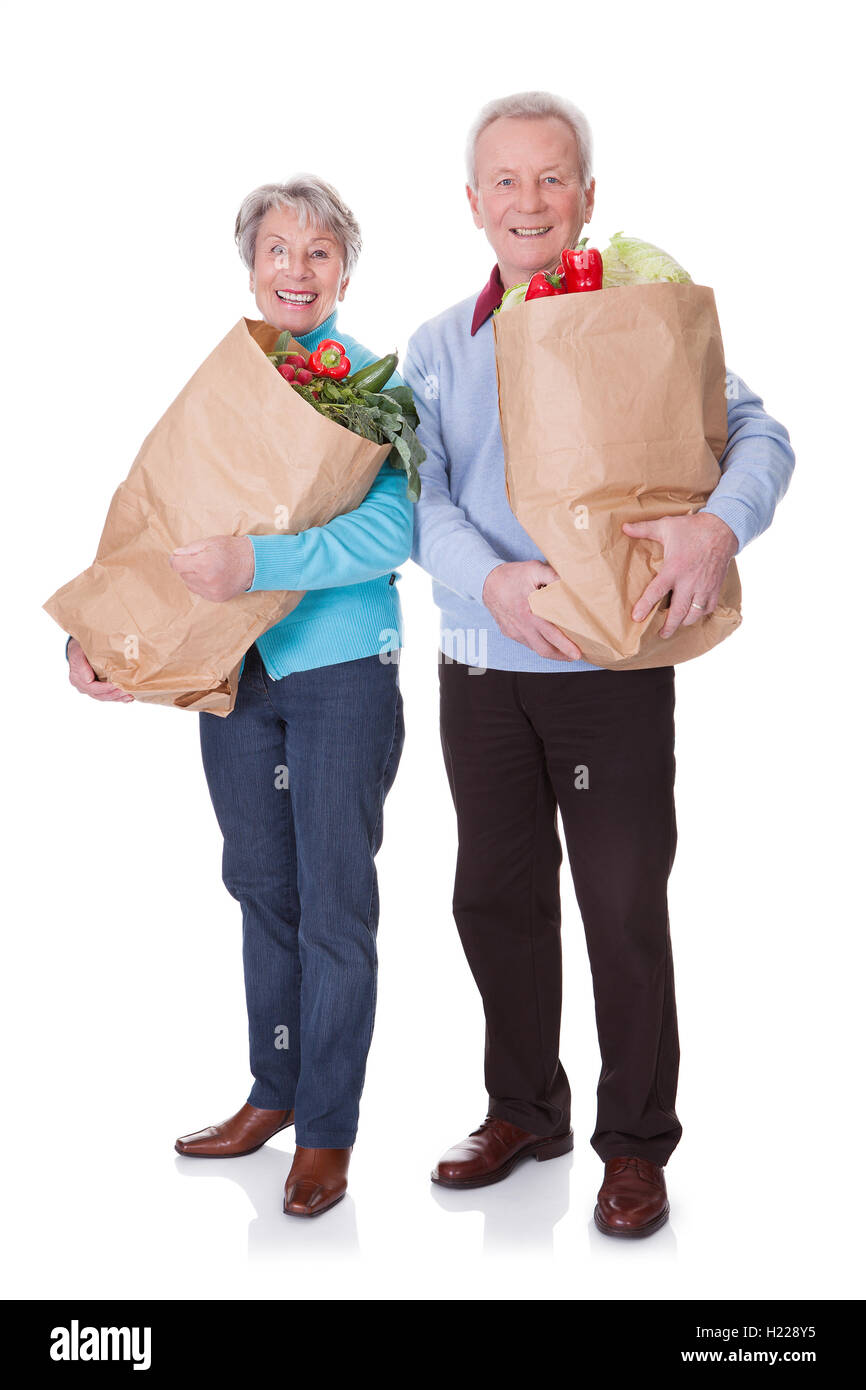 Happy woman shopping products Cut Out Stock Images & Pictures - Alamy