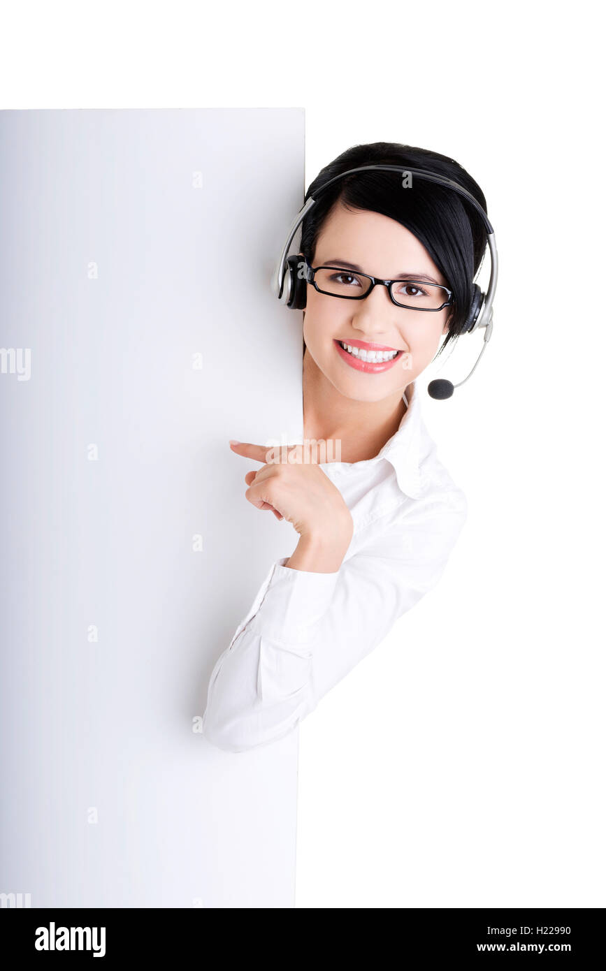 Call center worker holding blank sign board Stock Photo - Alamy
