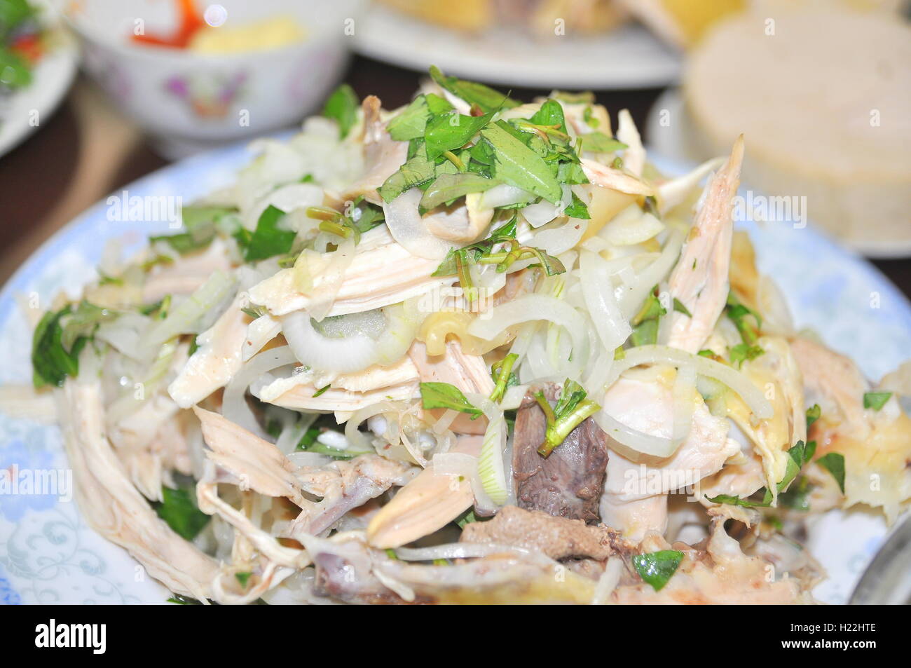 A traditional year end party with chicken, spring rolls and rice in ...