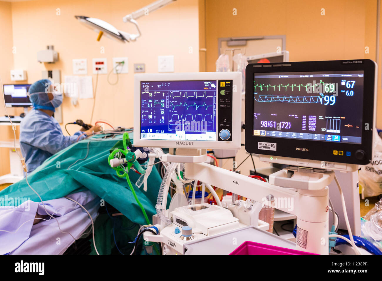 Surgical monitors being used to track the vital signs of a patient ...