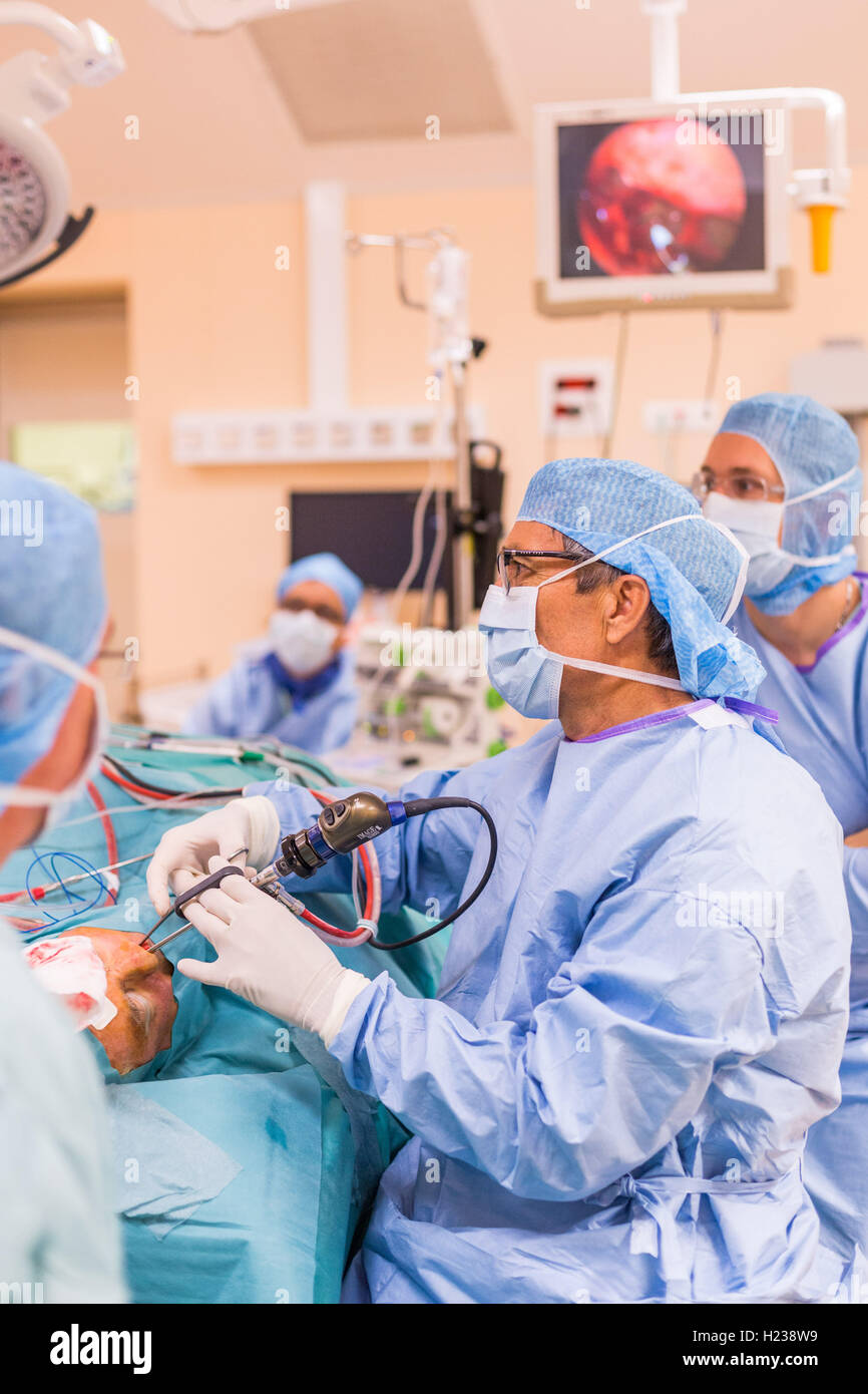 Sinus computer assisted surgery (neuronavigation). Surgeon performing ...