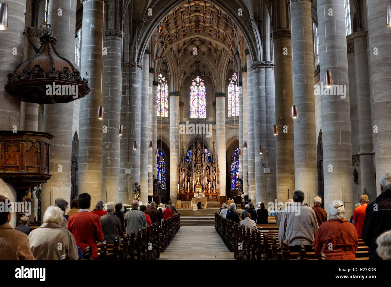 Mass in Heilig-Kreuz-Münster, cathedral, interior view, Schwäbisch Gmünd, Baden-Württemberg ...