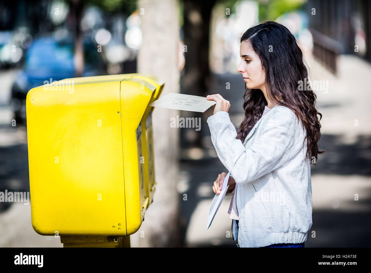 Woman posting letter Stock Photo - Alamy Woman posting letter Stock Photo - Alamy