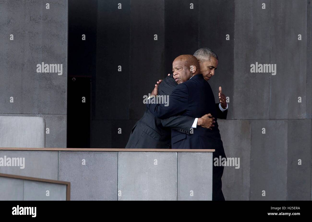 U.S.President Barack Obama embraces civil rights legend Rep. John Lewis ...