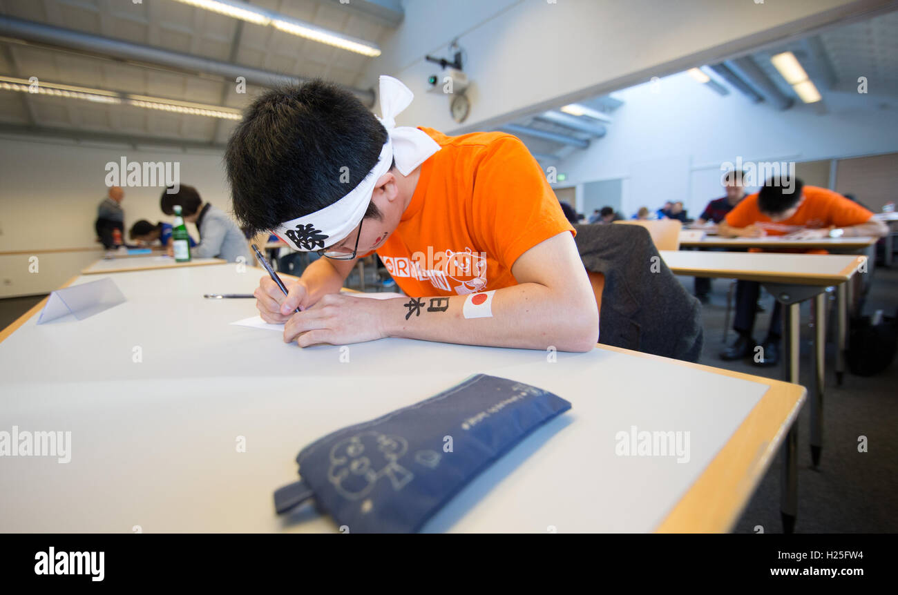 Bielefeld, Germany. 24th Sep, 2016. Tetsuya Ono from Japan calculating ...