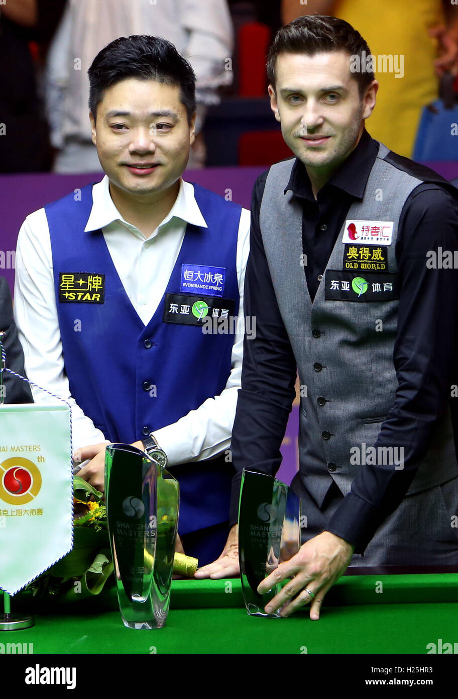 Shanghai, China. 25th Sep, 2016. Ding Junhui (L) of China poses with ...