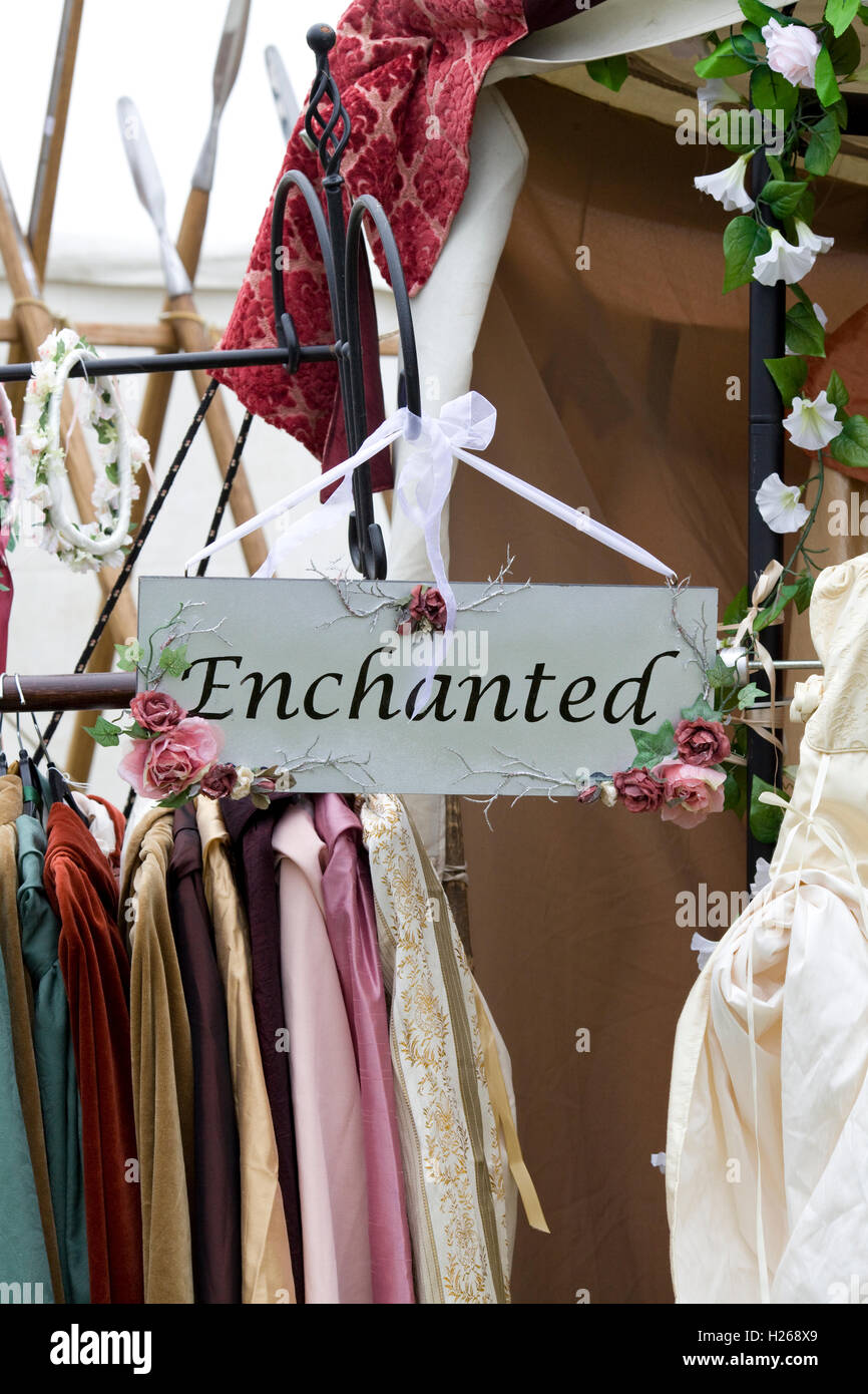 Enchanted sign tied with ribbon Stock Photo - Alamy
