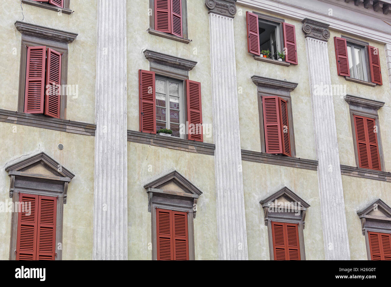 exterior of an old building with windows Stock Photo - Alamy