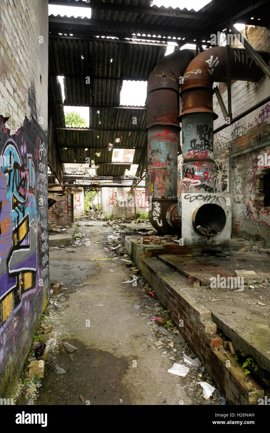 Graffiti and vandalism in abandoned derelict industrial building Stock ...