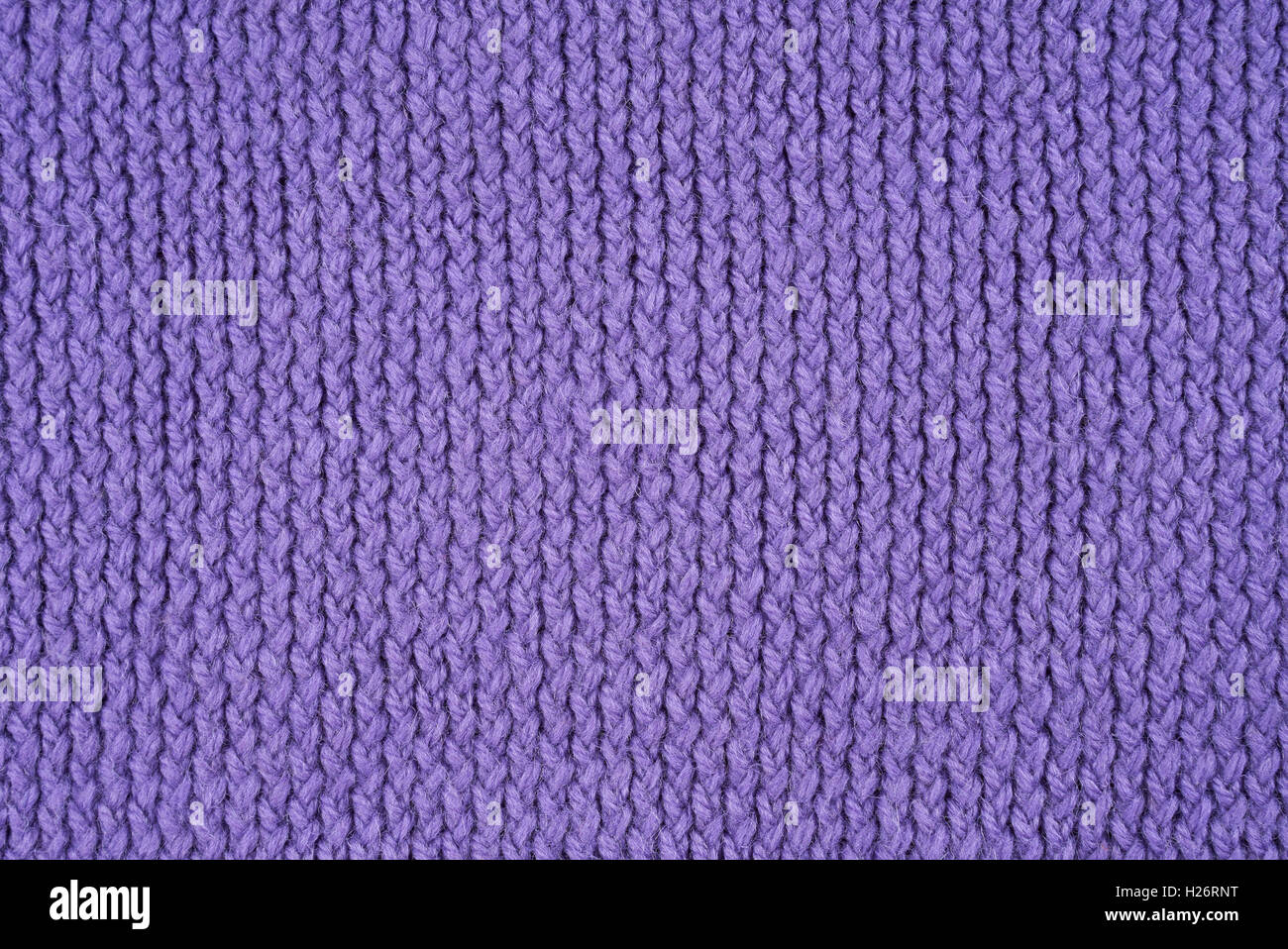 Violet knitted pattern as a seamless background Stock Photo - Alamy