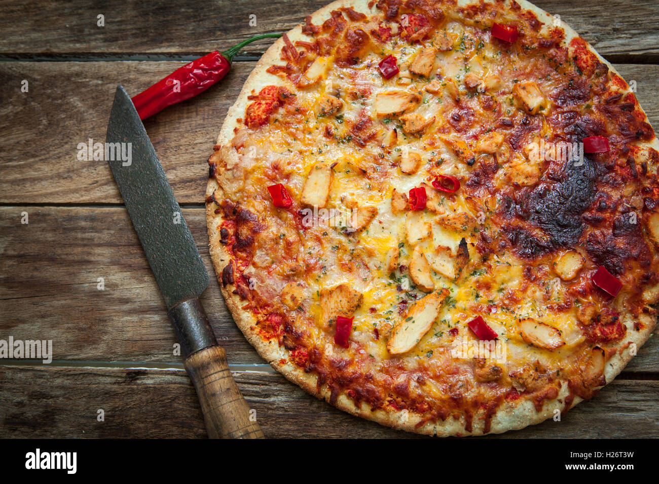 Homemade italian pizza with chicken and mozzarella Stock Photo - Alamy