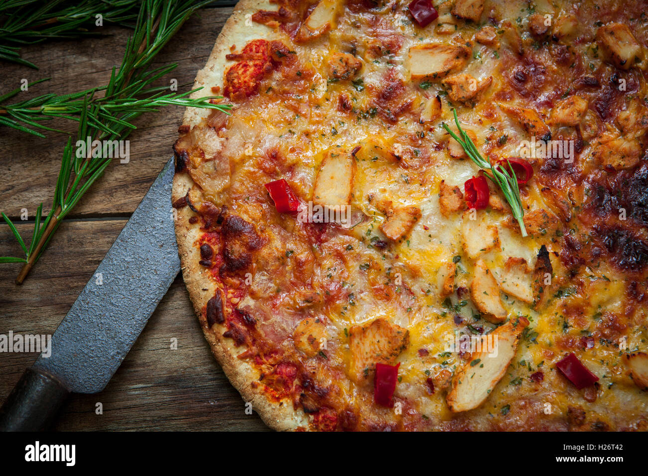 Homemade italian pizza with chicken and chili pepper Stock Photo - Alamy