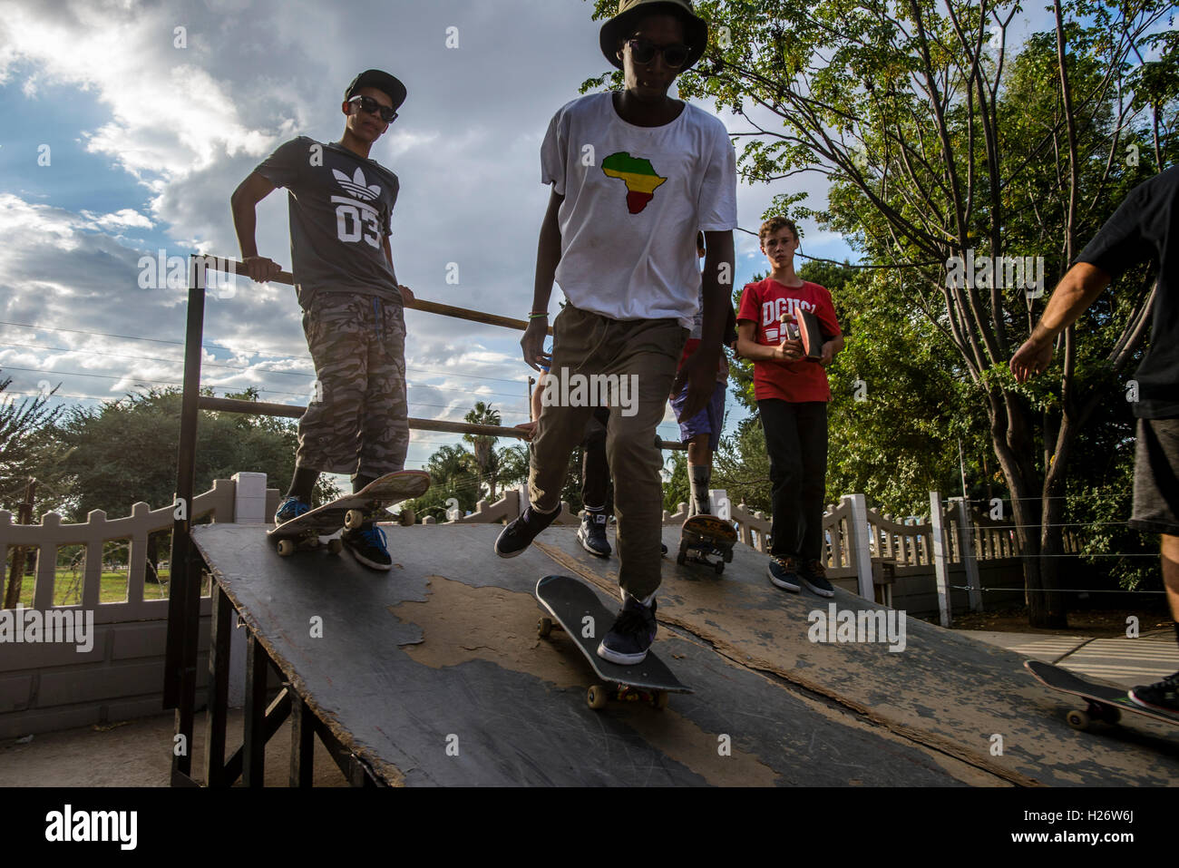 Skateboarders performing their tricks in a Skate Park in Windhoek ...