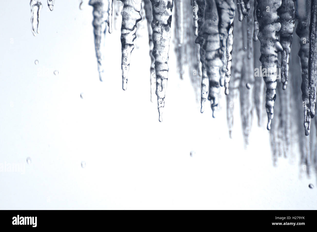 Cold icicles dripping with water behind Niagara Falls Stock Photo - Alamy