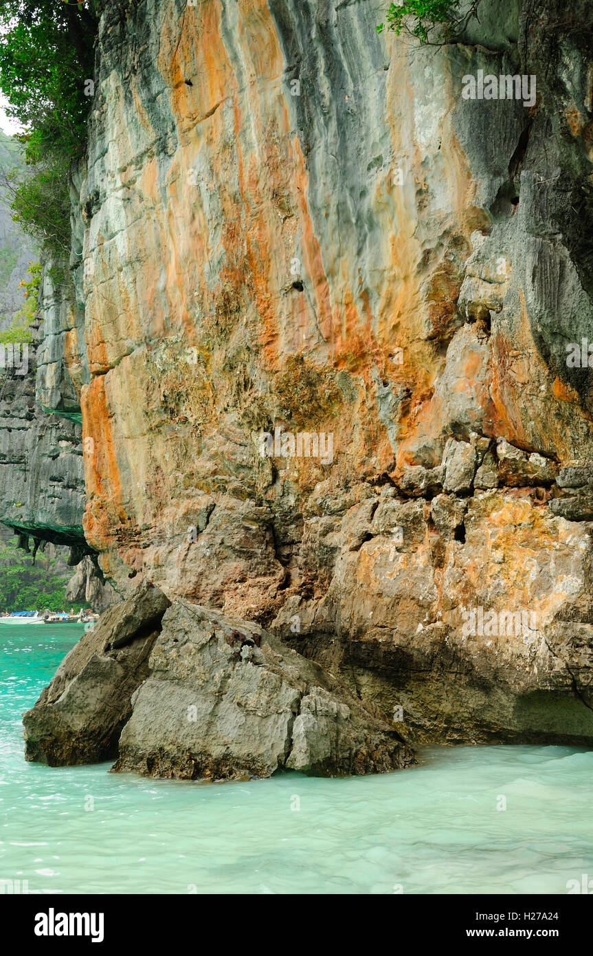 A weathered rock formation on the waters of Maya Bay located on Phi Phi ...