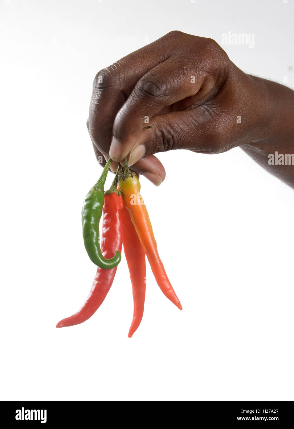 Hand holding chili hi-res stock photography and images - Alamy