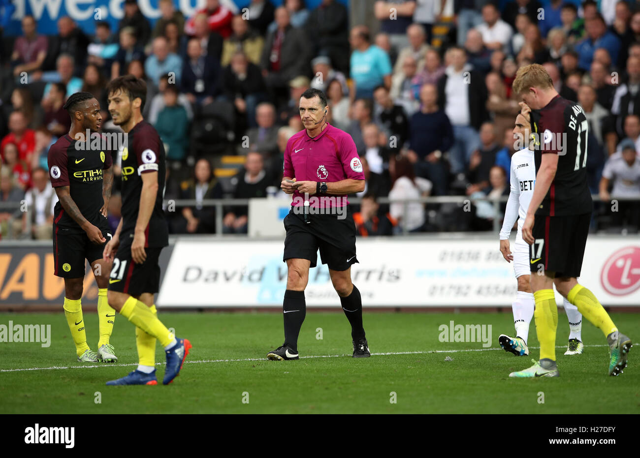 Referee Neil Swarbrick after awarding Manchester City a penalty during ...