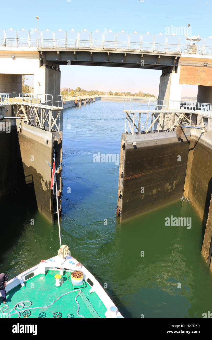 Approaching the Ship locks in Esna, and old dam on the Nile River ...