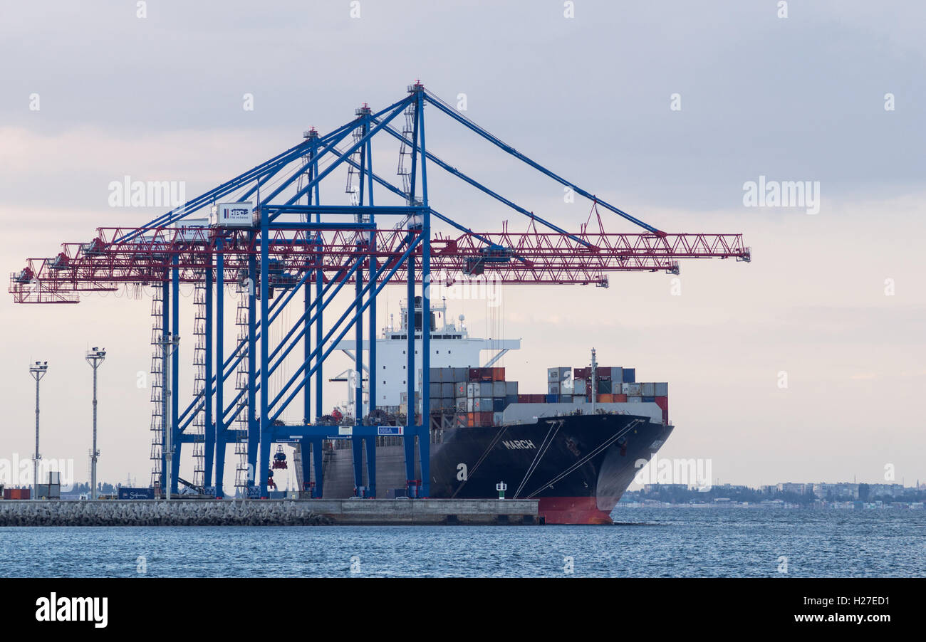 Odessa, Ukraine - September 23, 2016: Cargo ship and Dockyard cranes in ...