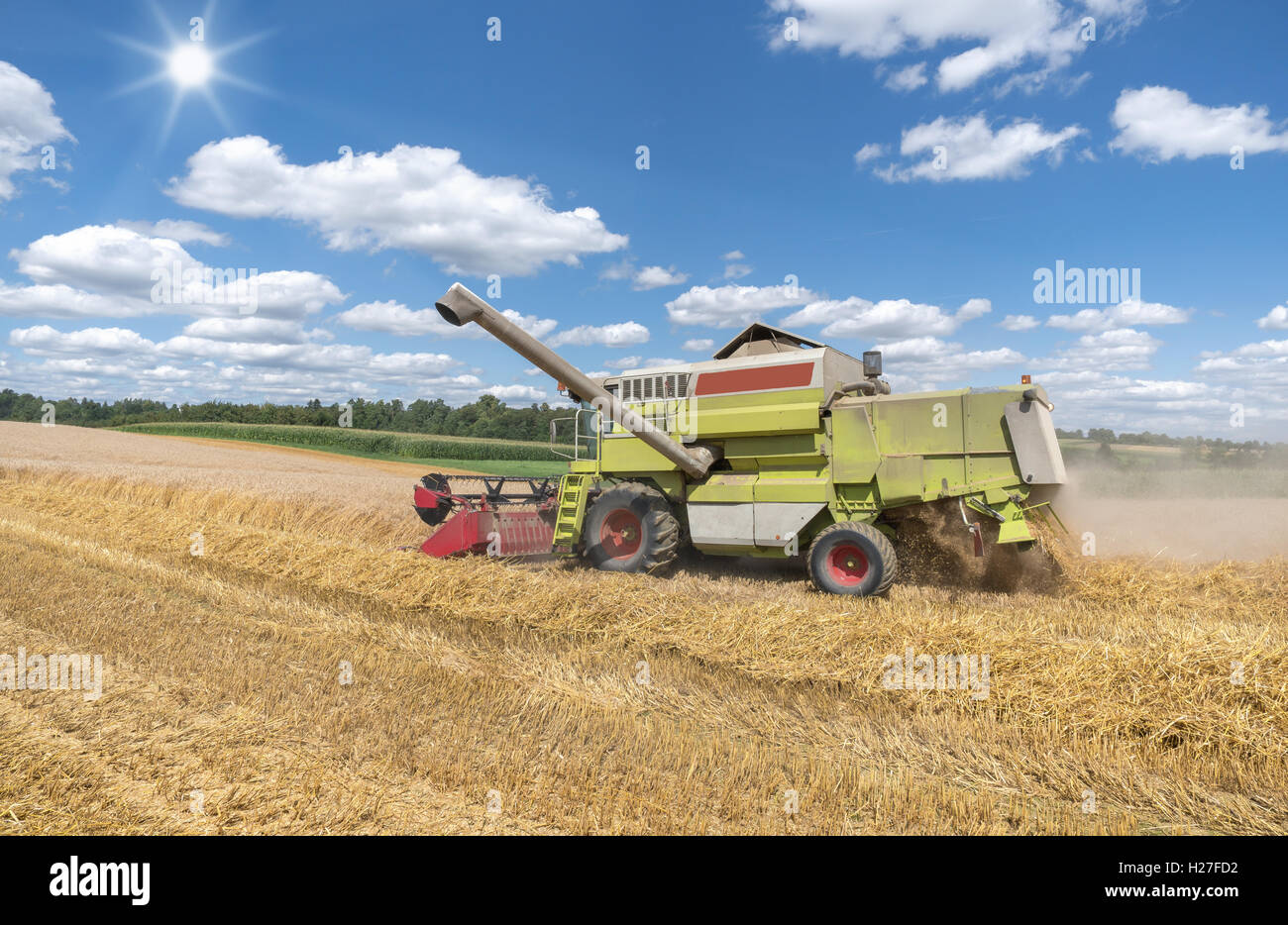 Combine harvester during harvest Stock Photo - Alamy