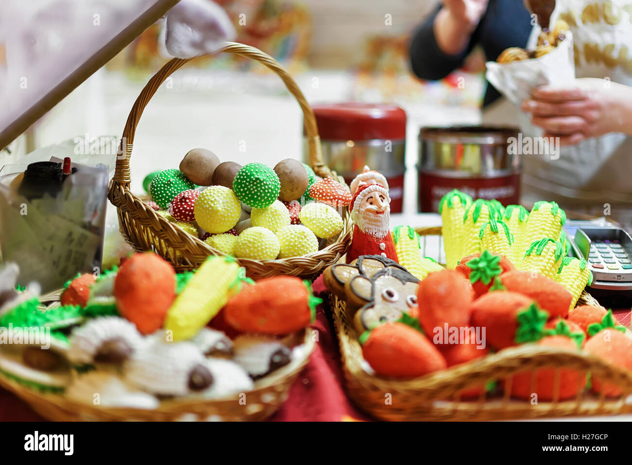 Stall with traditional colorful and festive sweets in Christmas Market ...