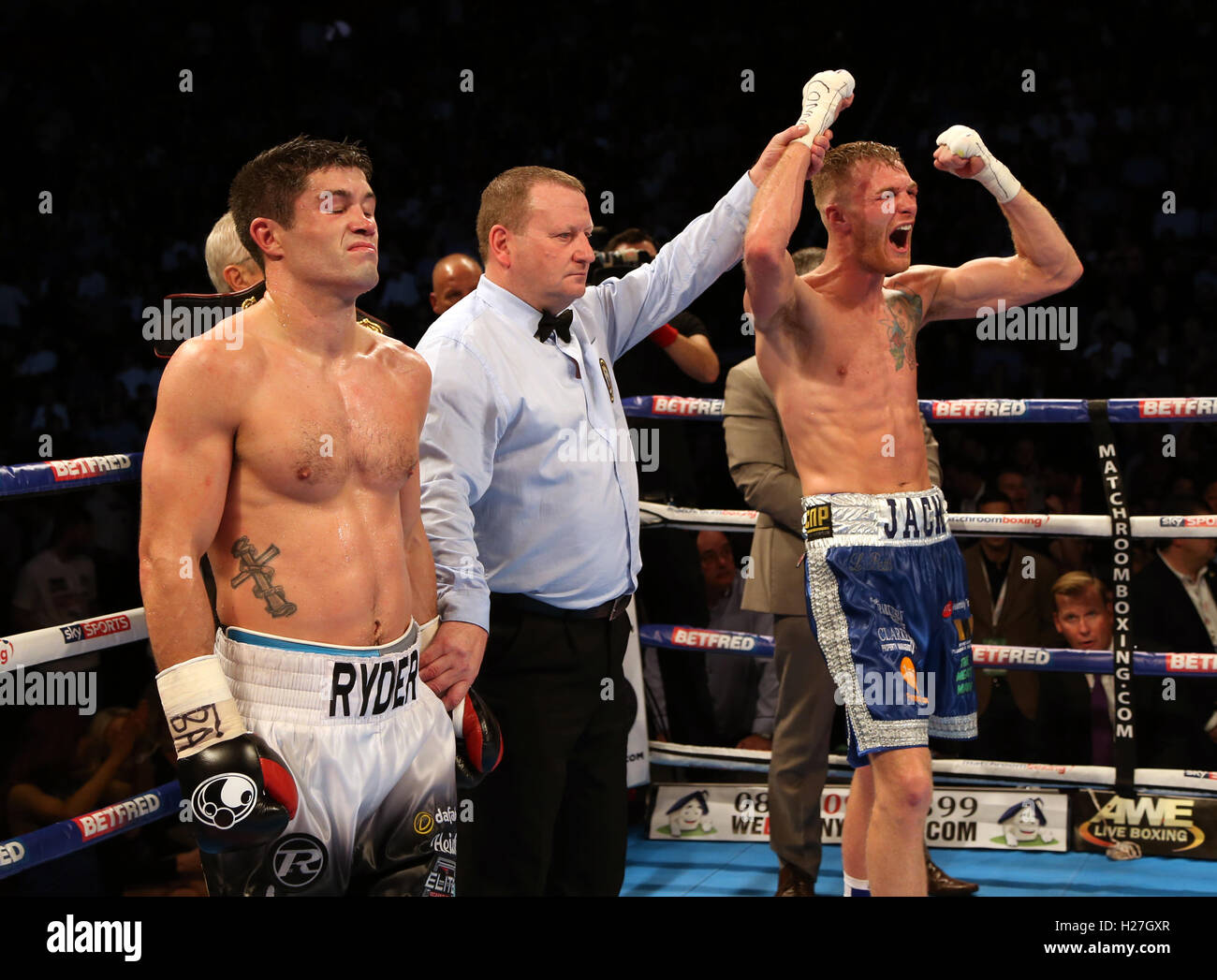 Jack Arnfield (right) celebrates beating John Ryder in the WBA ...