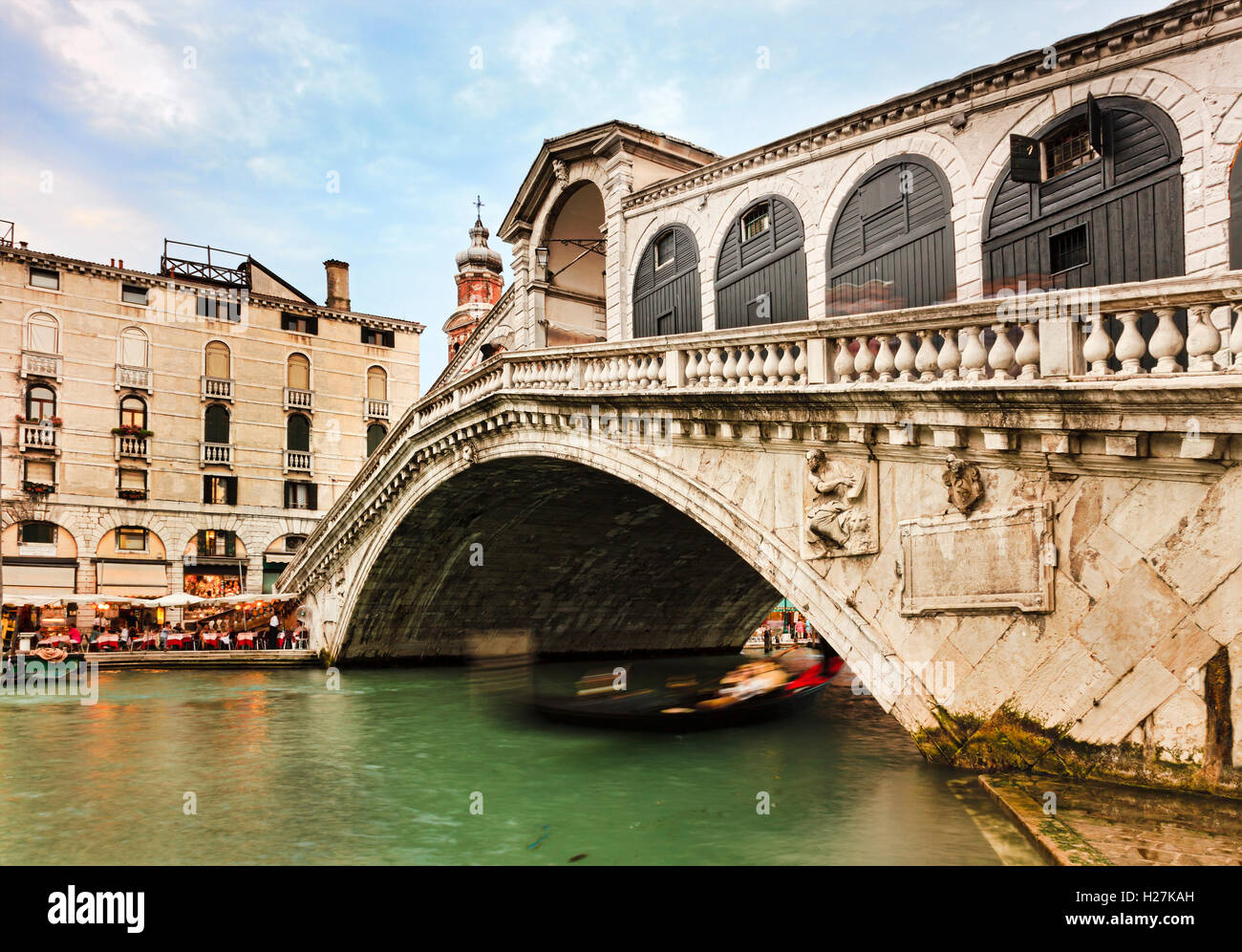 Historic stone bridge Rialto over Grand Canal in italian city of Venice ...