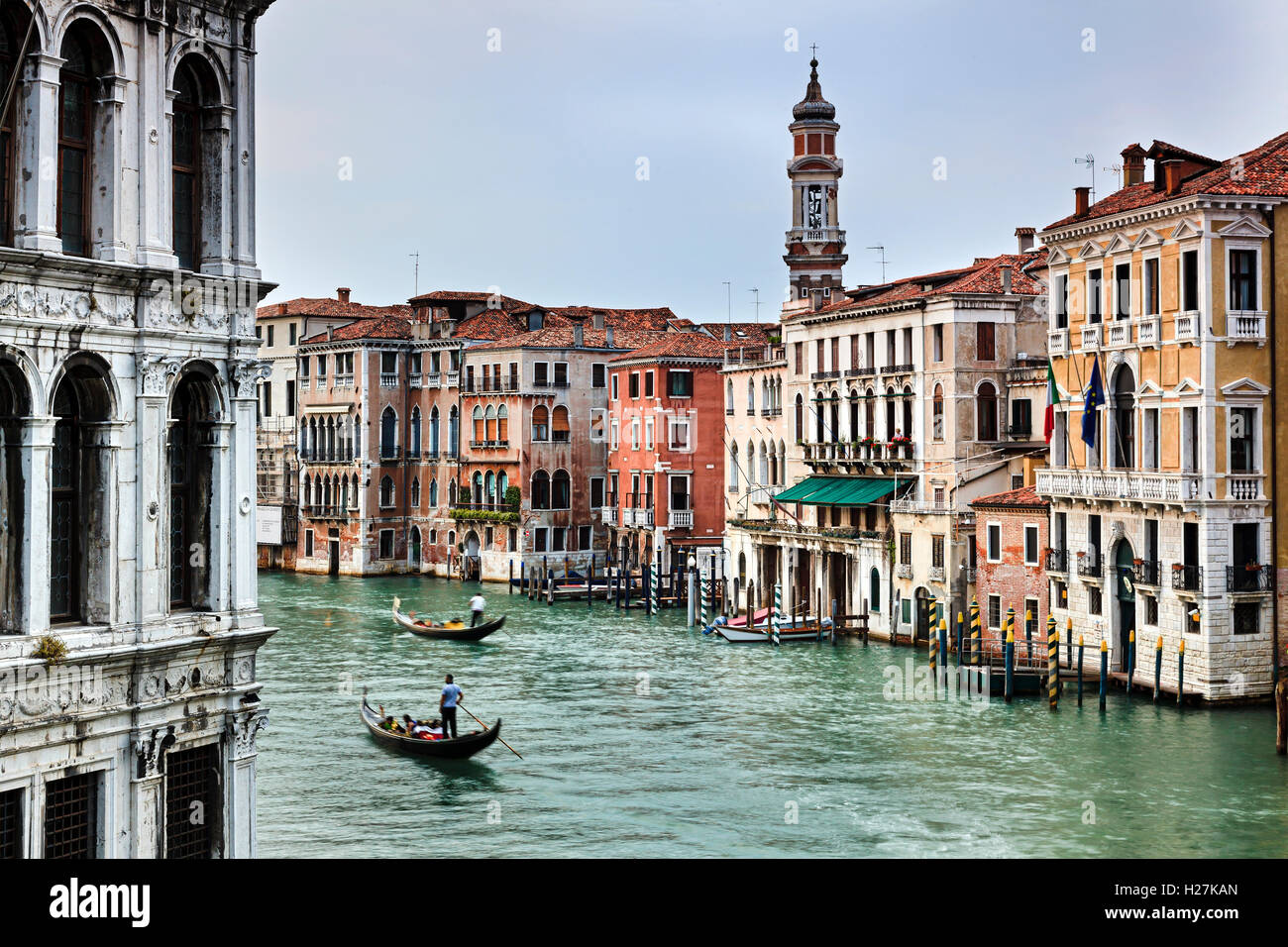 dense built colourful palace-houses of Venice along Grand Canal with ...