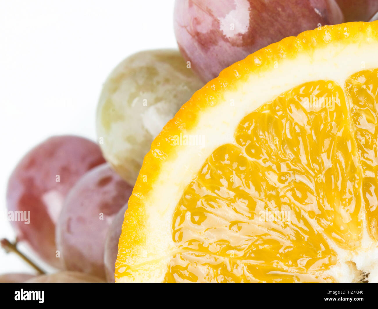 grapes and orange slice Stock Photo - Alamy